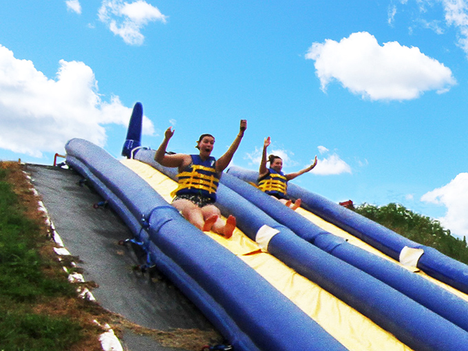 Dual water slides promise racing fun &ndash; friends challenge each other to see who reaches the water first.