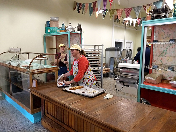 The friendly staff behind the counter prove that great baking requires both skill and heart, serving up smiles alongside those spectacular apple fritters every single day.