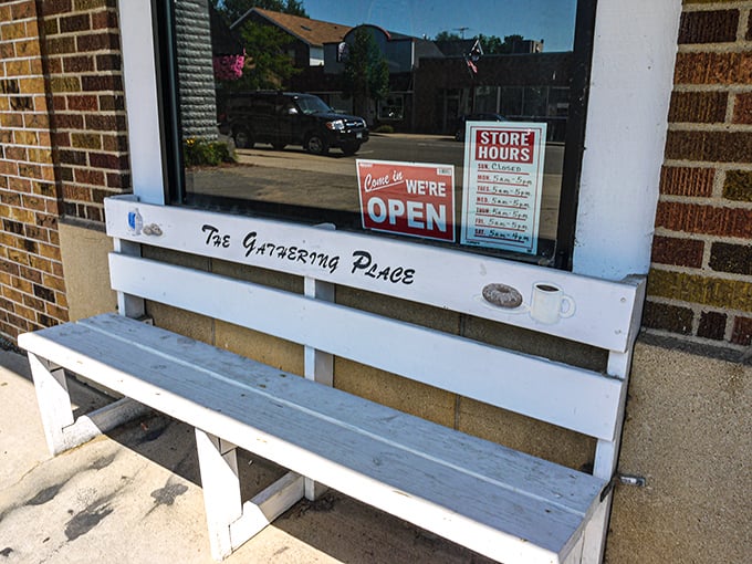 "The Gathering Place" bench outside perfectly captures the bakery's role as both cultural landmark and community hub in Lindstr&ouml;m.