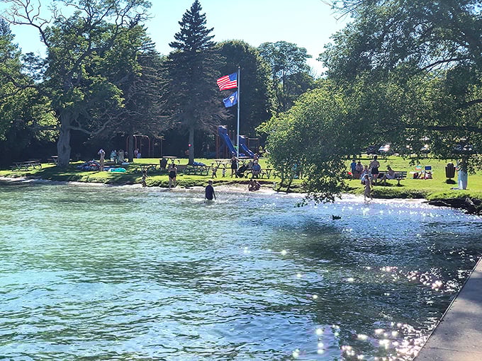 The public swimming area offers democratic access to luxury-level waters &ndash; proof that Michigan's best experiences don't require a membership card.
