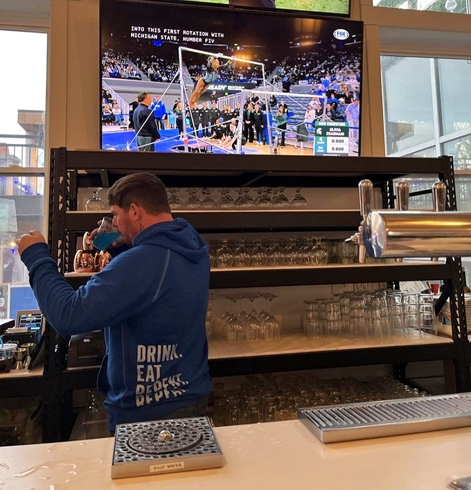 Sports on the screen, beer in hand – a different kind of Sunday worship happening at this transformed sacred space.