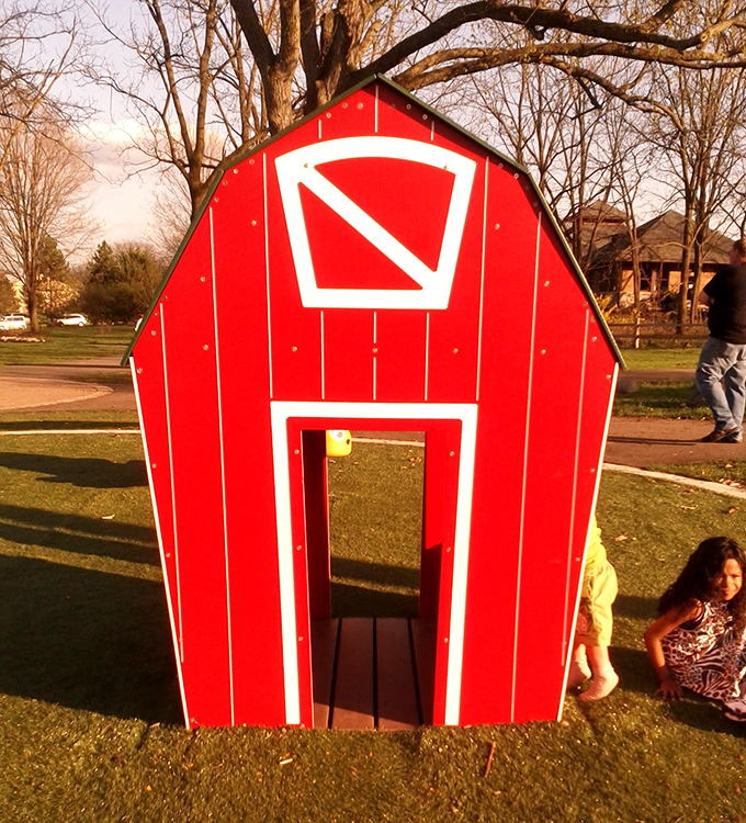 Inside this little red barn, imaginations grow faster than weeds in July, minus the need for actual farm chores.