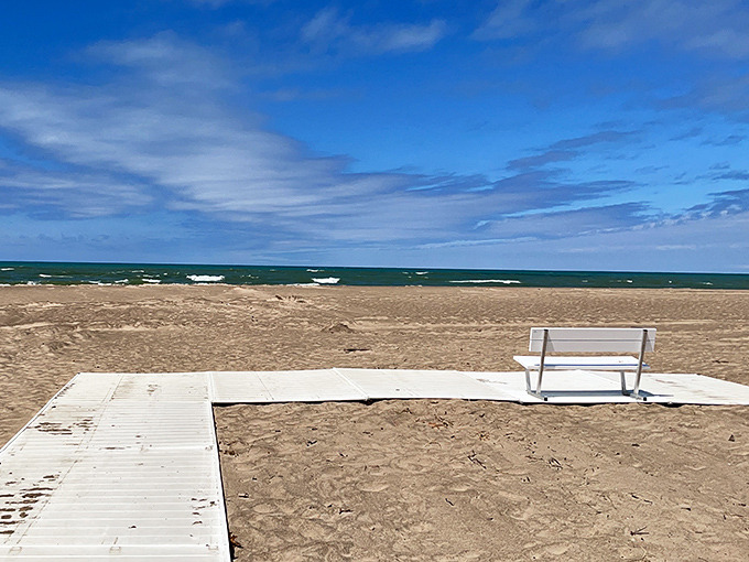A solitary bench offers the perfect front-row seat to nature's greatest show &ndash; the meeting of sky and water.