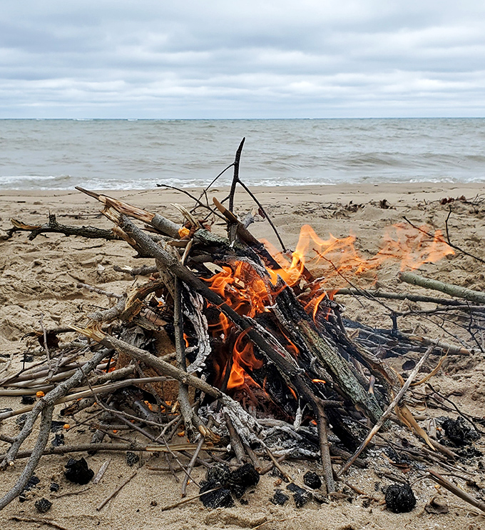 Beach bonfires crackle and dance against the backdrop of Lake Michigan, turning strangers into friends as stories flow freely.