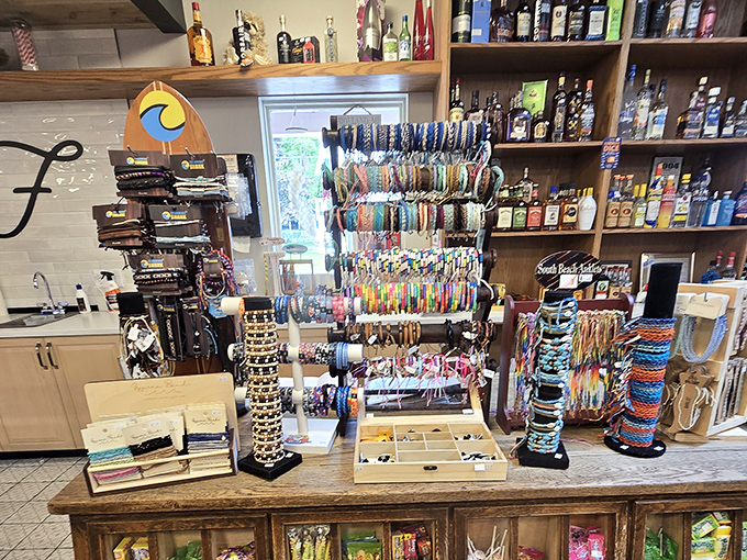 Colorful bracelets and beach accessories line the counter &ndash; because memories need souvenirs, and wrists need decoration after a day of wave-catching.