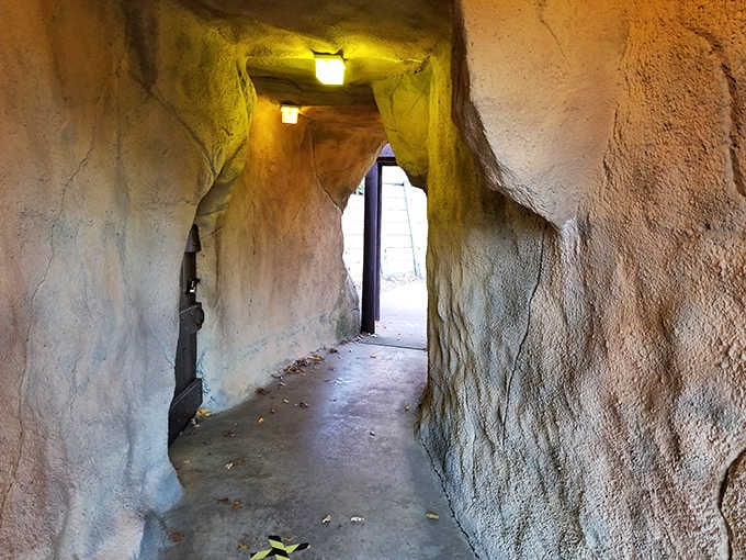 Stone pathways wind through cool caverns, where shadows dance across walls and the temperature drops just enough for midday relief.