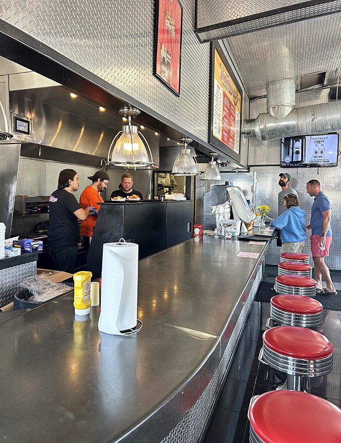 Classic counter seating invites solo diners and couples to perch and watch the culinary action &ndash; diner-style eating at its most authentic.