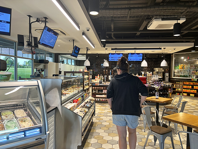 Customers browse the market's offerings, where everyday shopping becomes a treasure hunt for gourmet discoveries and local specialties.