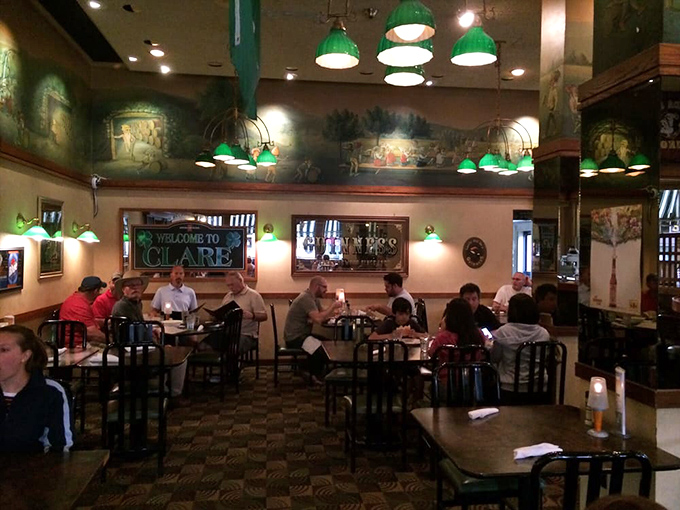 Diners enjoy the perfect blend of comfort food and convivial atmosphere, with Michigan sports memorabilia adding local flavor to the Irish-themed surroundings.