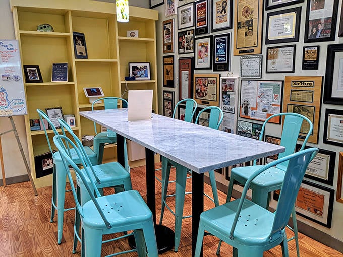 The cozy dining area invites you to sit and savor each bite, surrounded by the bakery's impressive collection of awards and accolades.