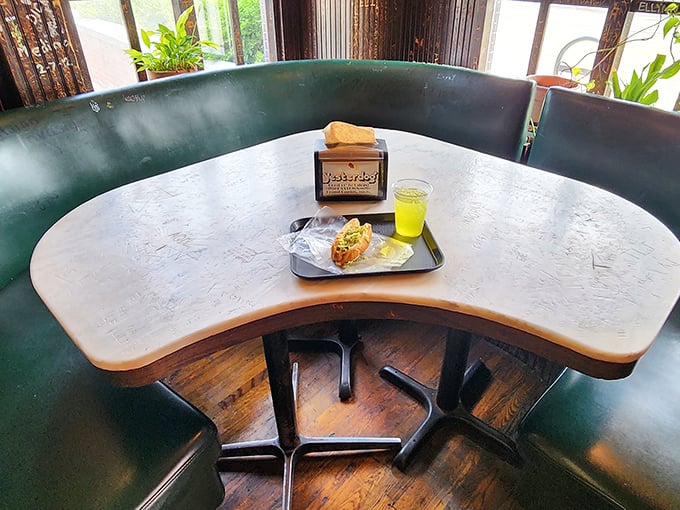 Each booth tells its own story &ndash; worn smooth by decades of diners enjoying Michigan's most beloved hot dogs in comfortable, unpretentious surroundings.