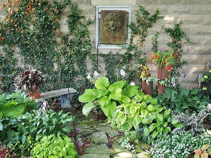The secret garden beckons with lush hostas and climbing ivy &ndash; a tranquil retreat where time seems to stand perfectly still.