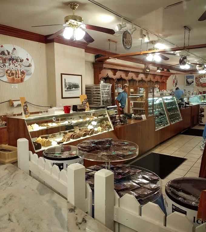 The stone walls and wooden beams create dining nooks that feel like you've discovered a secret room in a fairy tale castle.