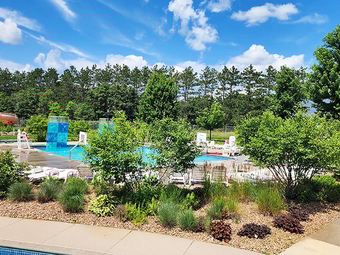 The park's thoughtful landscaping creates natural borders between attractions, transforming concrete and chlorine into a lush aquatic garden.