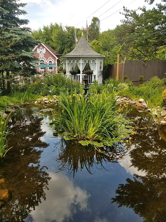Tranquility finds a home in this koi pond. The gazebo reflection creates a perfect mirror world where sky meets water.
