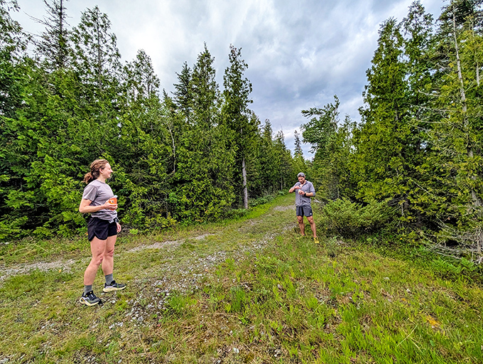 Fellow nature enthusiasts explore the park's diverse terrain, where every trail offers new discoveries and perspectives.