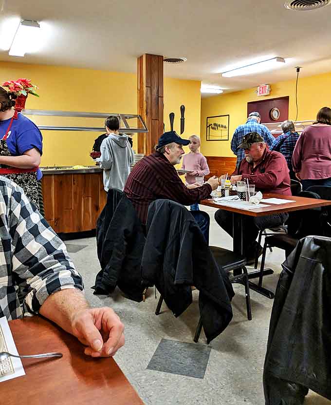 The true heart of any great diner: regulars gathering over coffee and conversation, creating the community that keeps places like this alive.