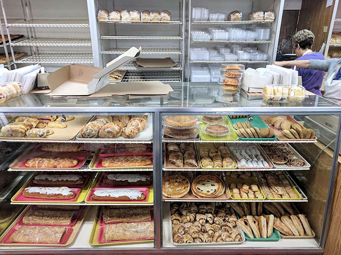 Display cases gleaming with possibility &ndash; a museum of edible art where each shelf holds treasures more valuable than diamonds.