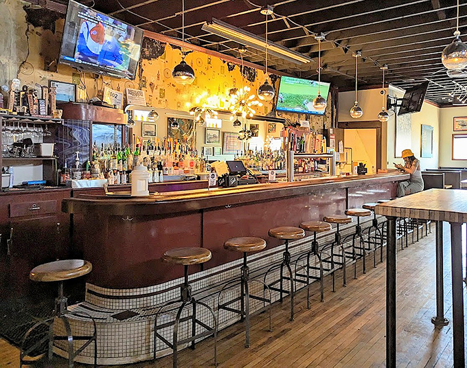 The bar area serves as command central for The Cosmos' impressive selection of craft beers and creative cocktails that orbit around their pizza offerings.