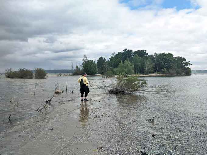 The isthmus connecting parts of Bassett Island creates a natural bridge where land and water play their eternal game of give and take.