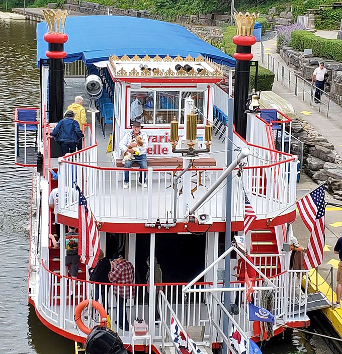 The Belle's stern view showcases its paddlewheel and distinctive crowns &ndash; nautical royalty that rules this small stretch of Michigan waterway.
