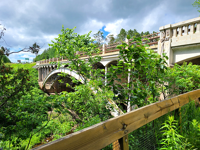 This historic bridge offers both passage and perspective &ndash; framing the falls below while telling its own story of Michigan's industrial past.