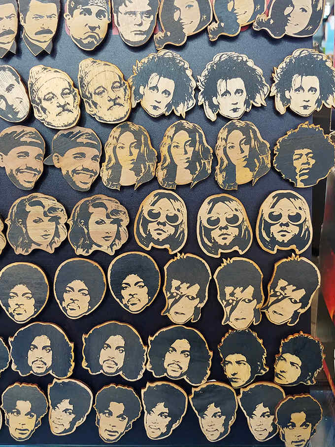 These wooden musician caricatures capture the essence of legends from Prince to Bowie – folk art meets rock and roll in perfect harmony.