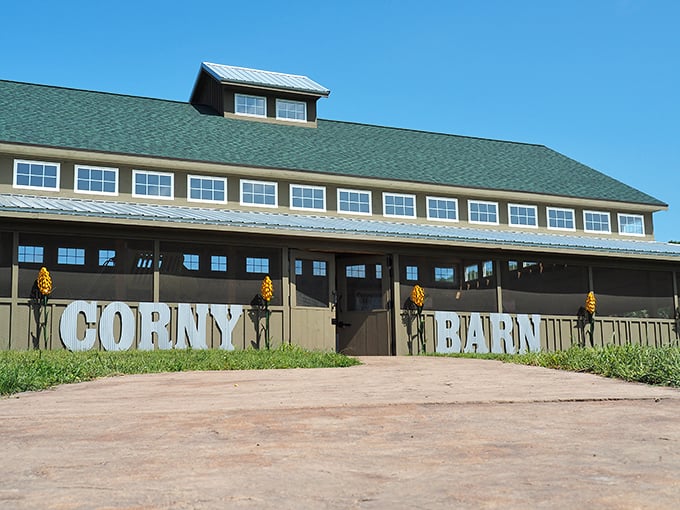 The impressive Corny Barn stands as the farm's agricultural centerpiece, its modern design honoring Michigan's farming heritage with style.