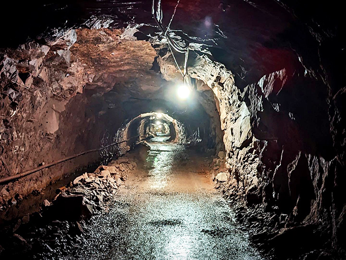 Follow the light at tunnel's end, just as miners did for generations, hoping each shift would end with a return to daylight.