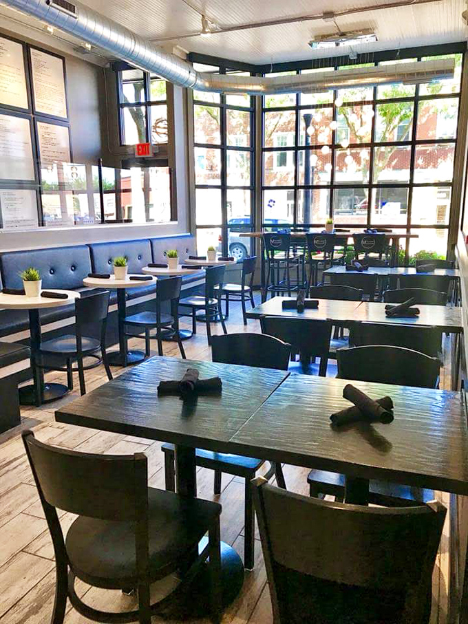 Conversations flow as freely as chocolate sauce in this inviting dining area, where strangers become friends united by their mutual appreciation for excessive desserts.