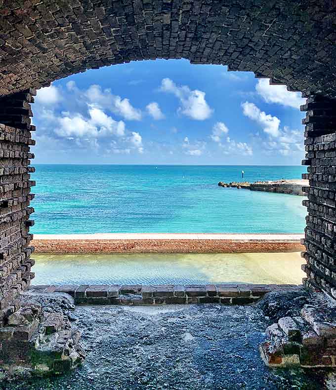 Nature's perfect window: centuries-old brick frames a view that no resort could ever replicate. The original infinity pool, courtesy of Mother Nature.