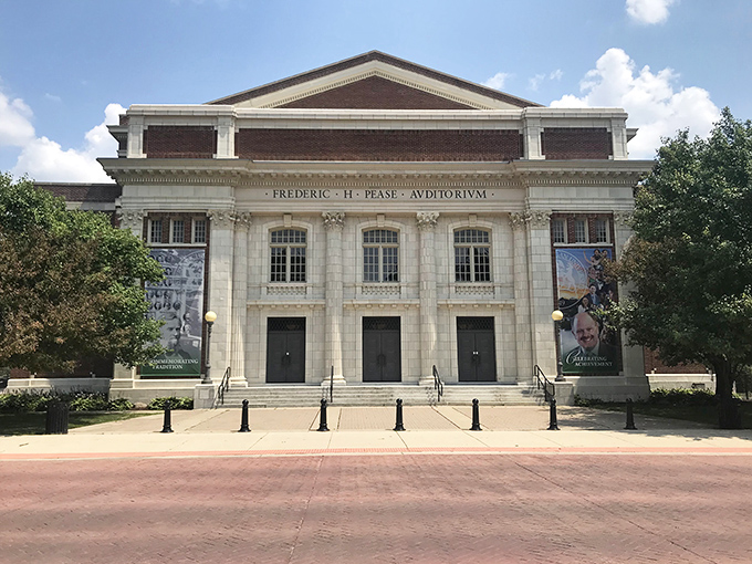 The stately Pease Auditorium welcomes visitors with classical columns and the promise of performances that feed the soul.