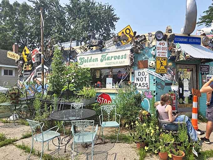 Garden seating where flowers and repurposed street signs create Michigan's most unusual outdoor dining experience.
