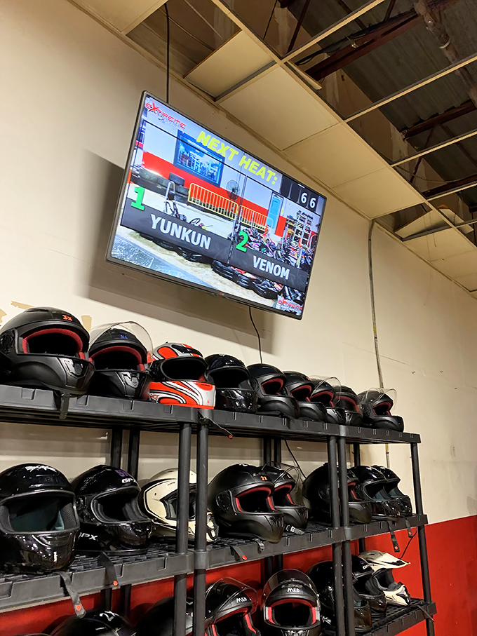 Digital race results displayed on overhead monitors fuel the competitive spirit and give bragging rights to the fastest drivers.