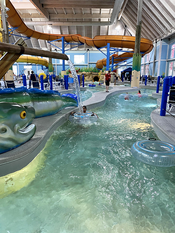 Gentle currents guide inner tubes along the lazy river, where relaxation is mandatory and unexpected sprinkles of water keep nappers alert.