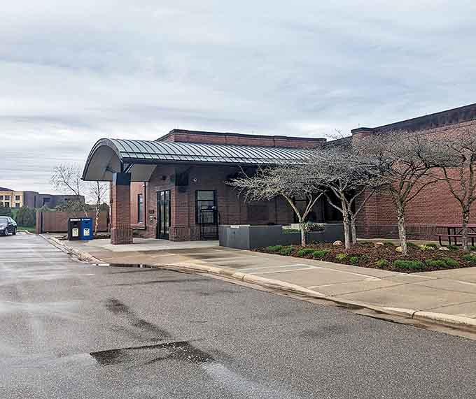 The Hastings Library welcomes visitors with its classic brick facade – just one of many public spaces that honor the town's architectural heritage.