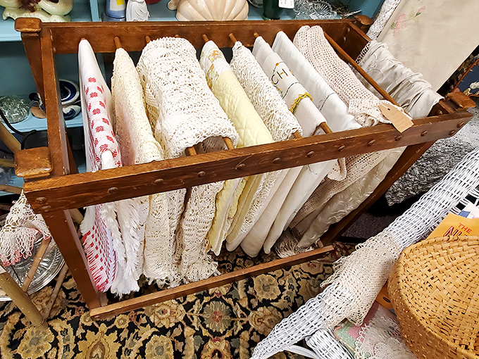 Handcrafted linens and delicate lacework showcase the patient artistry of generations past, each stitch telling stories of domestic creativity.