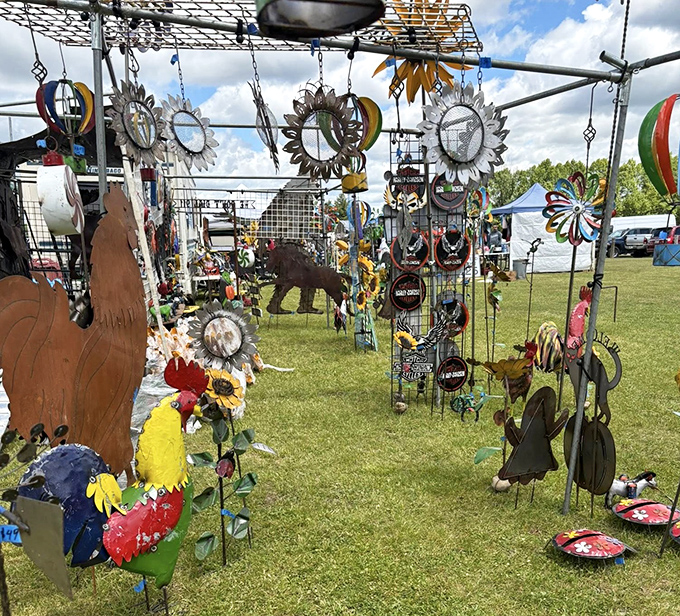 Whimsical metal suns and garden creatures catch the light &ndash; outdoor art that adds personality to patios and flower beds.