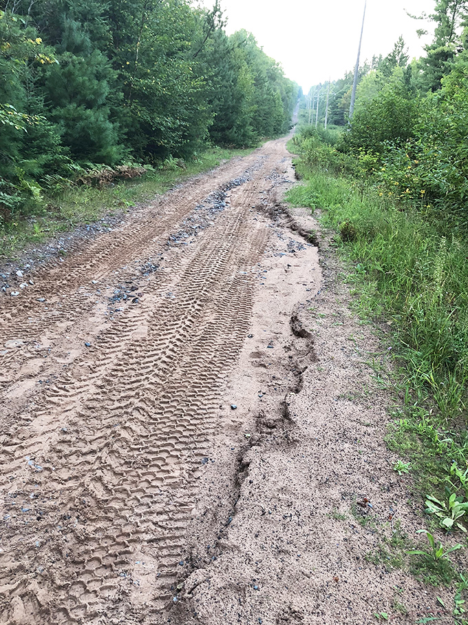 Tire tracks tell tales of curious travelers who've journeyed from across the country to witness Michigan's dancing lights.