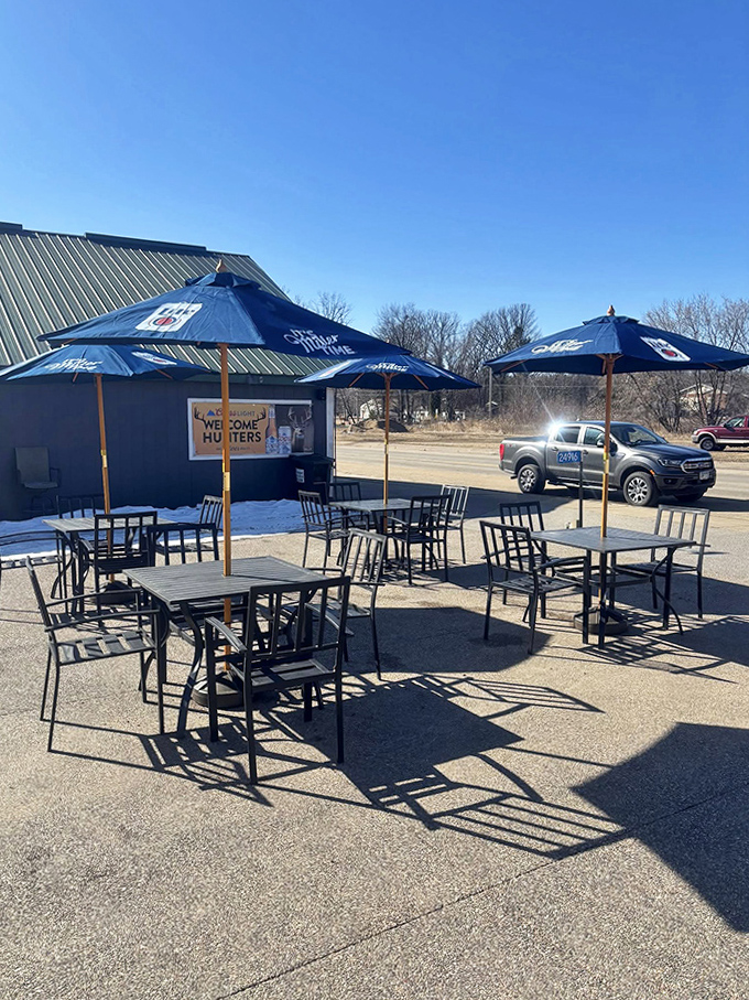 Outdoor seating under branded umbrellas offers the perfect spot to enjoy Wisconsin's brief but glorious summer months.