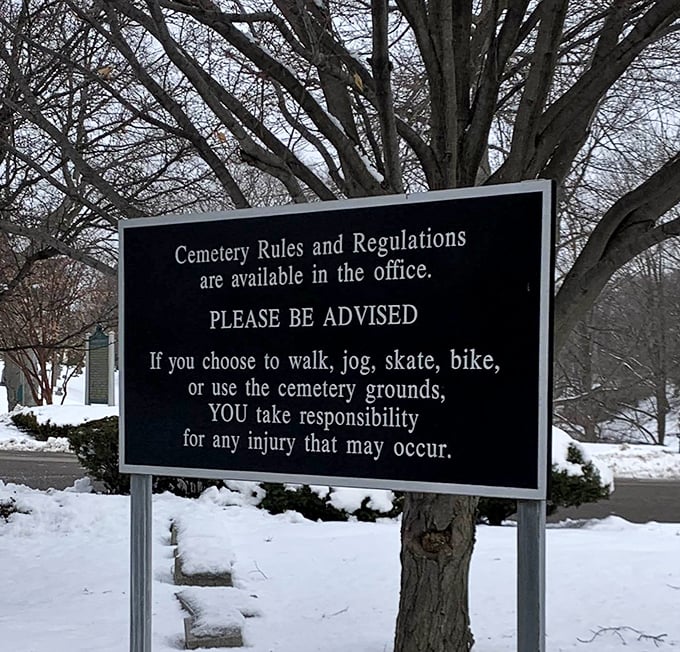 Even the cemetery's signage carries a touch of wry humor – where else are you reminded to take responsibility while jogging among history?