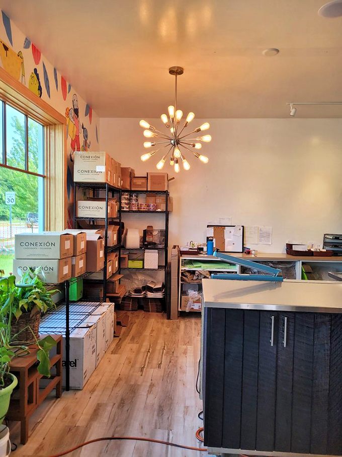 The production area offers a glimpse into the meticulous craft behind each perfect piece of chocolate that makes it to the display case.