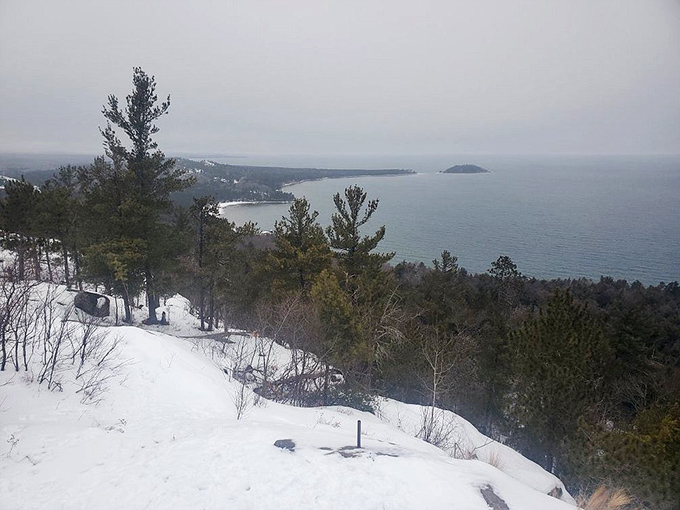 Winter's icy grip transforms Lake Superior's shoreline into a crystalline wonderland that looks like Elsa from Frozen had a creative burst.