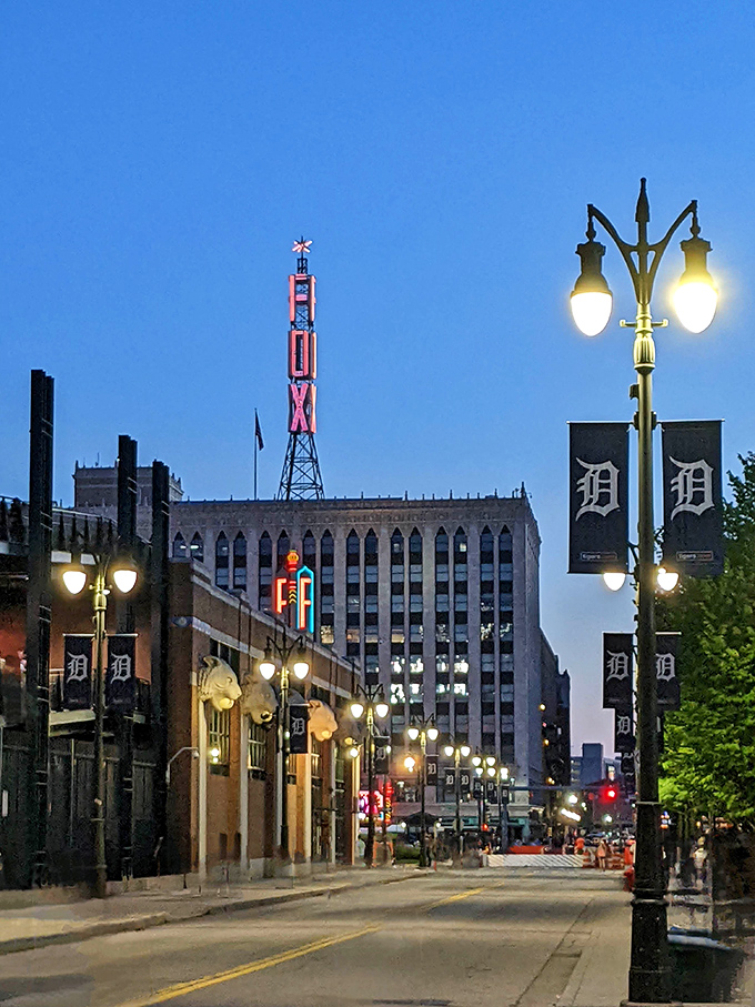 The Fox's spire stands tall against the Detroit skyline, a beacon of entertainment that's outlasted countless trends and challenges.