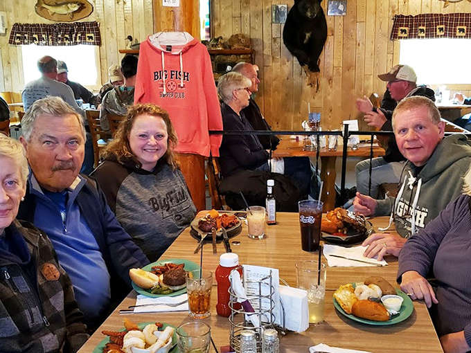 Happy diners sharing stories and hearty meals &ndash; the true essence of Minnesota's beloved supper club tradition.