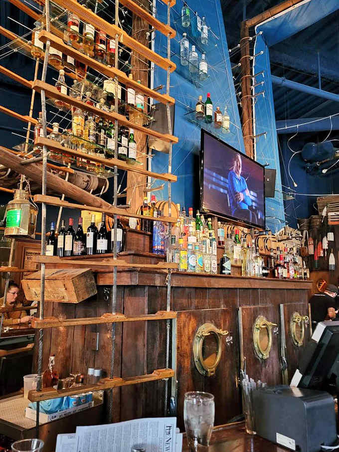 Bottles arranged like a sailing vessel's rigging &ndash; because good journalism, like good spirits, requires proper structure and a steady hand.