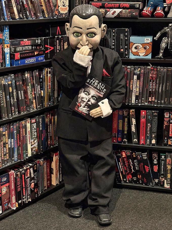 This ventriloquist dummy isn't just holding a horror movie &ndash; he's silently judging your childhood fear of him and his creepy kind.