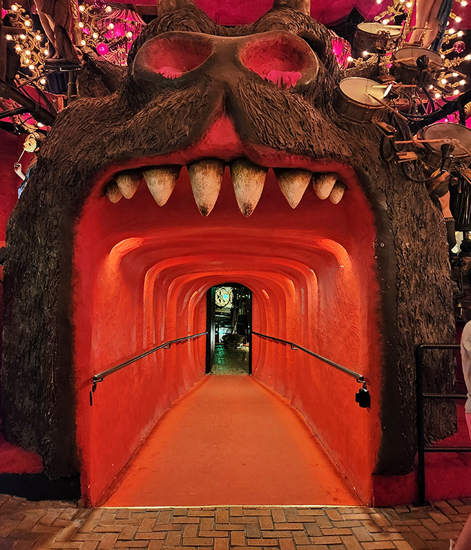 A monstrous mouth forms an unforgettable entryway, daring visitors to step between giant fangs into yet another realm of the bizarre.
