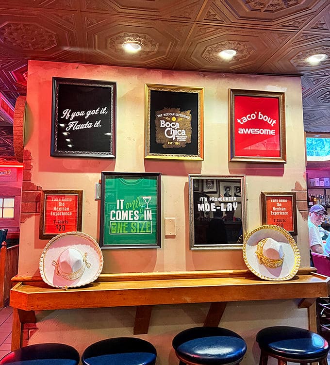 Playful wall art captures the restaurant's personality&mdash;witty phrases and Mexican sombreros adding character to every corner of the space.