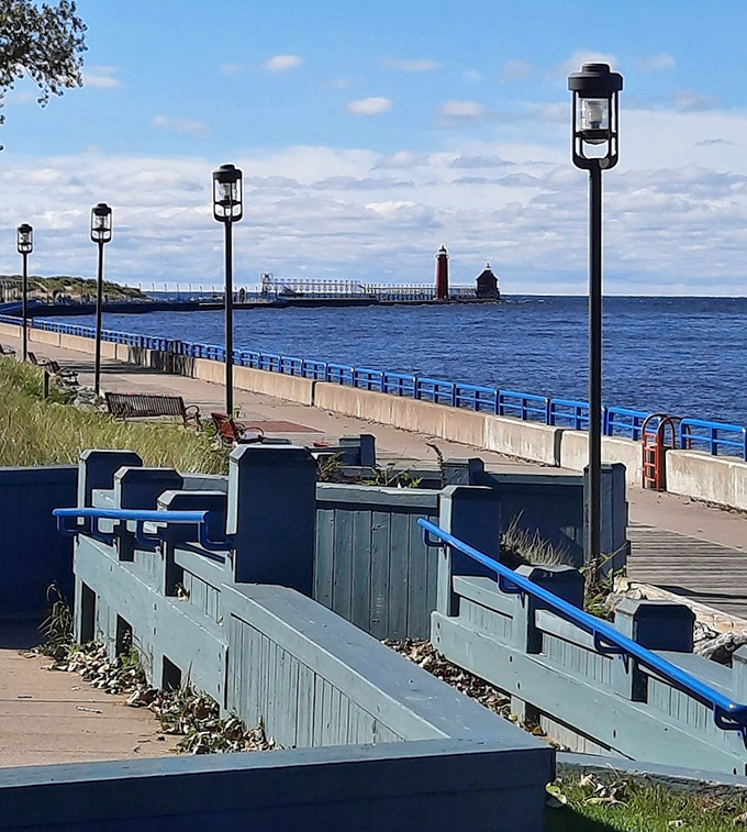 From the promenade, the distant lighthouses beckon like old friends, promising adventure at the end of a scenic stroll.